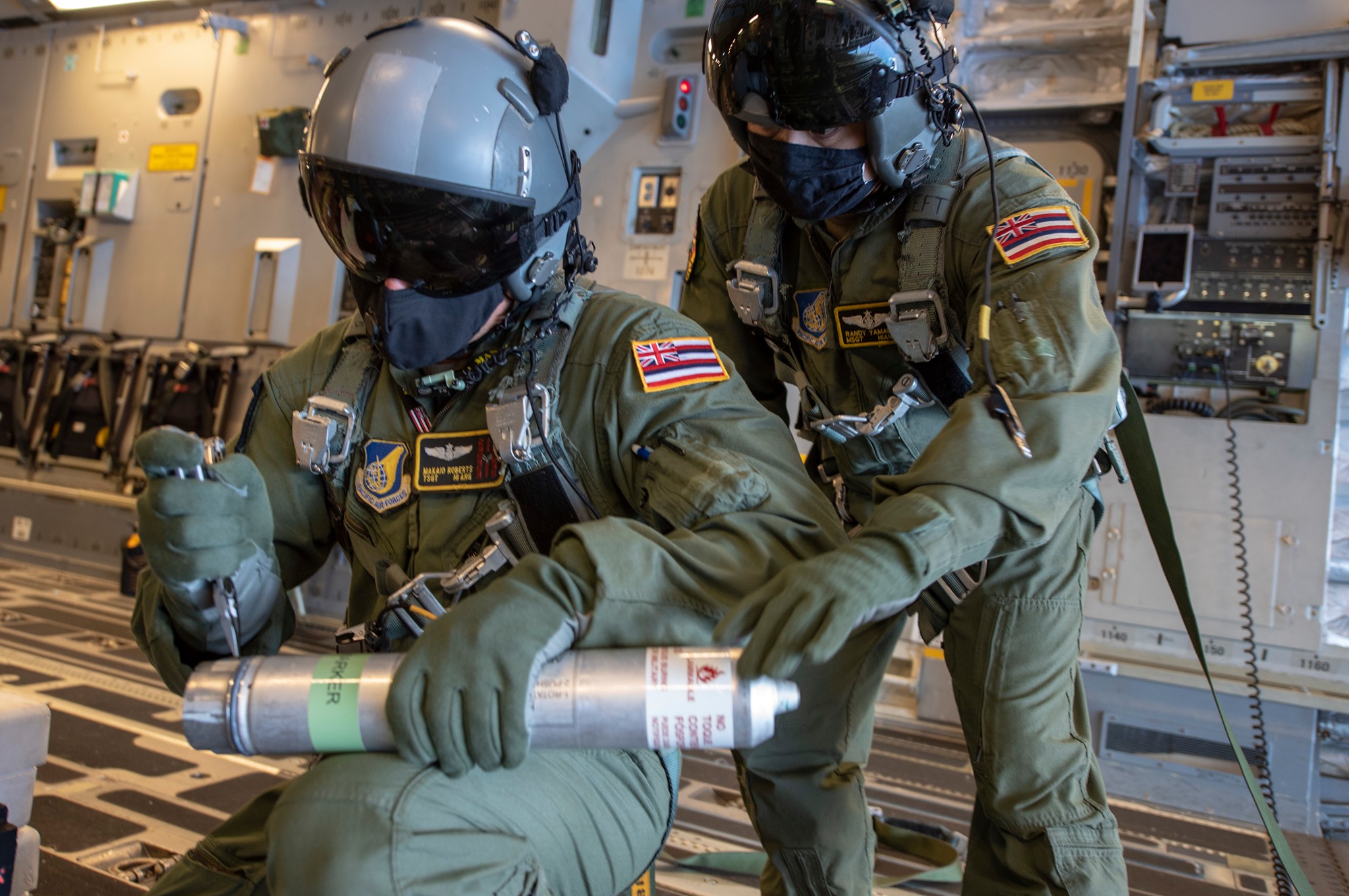 Retiree News | 204th Airlift Squadron Loadmasters Practice Flare Deployment